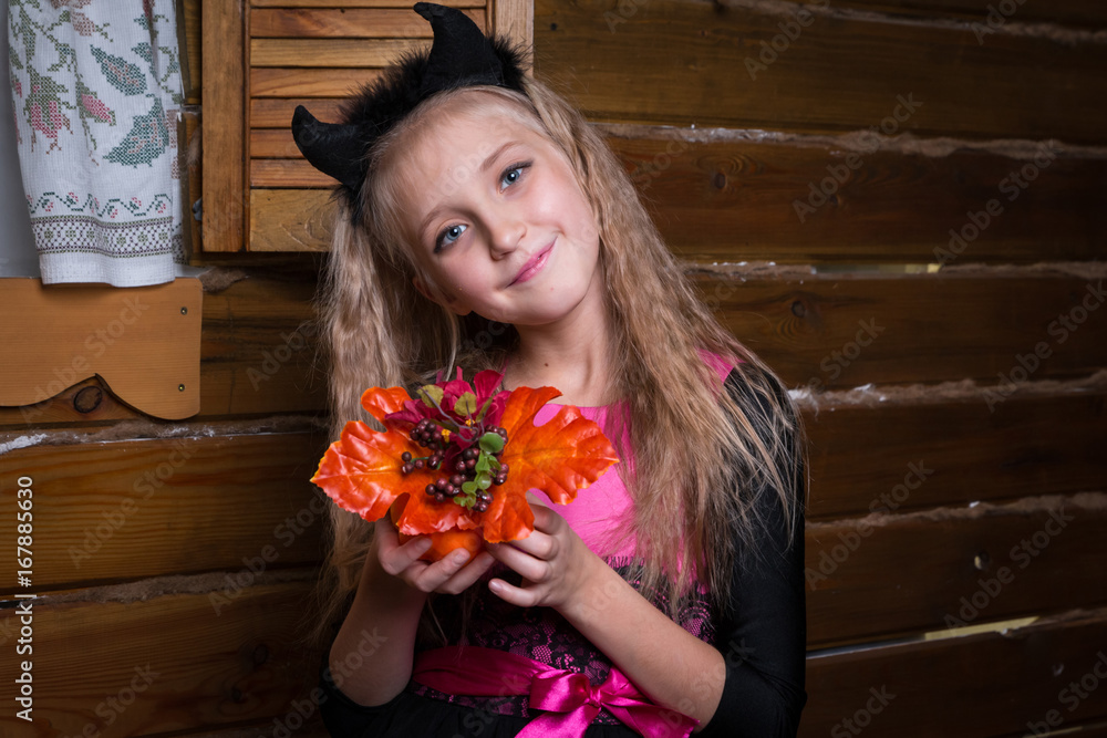 Cute little girl witch Stock Photo | Adobe Stock