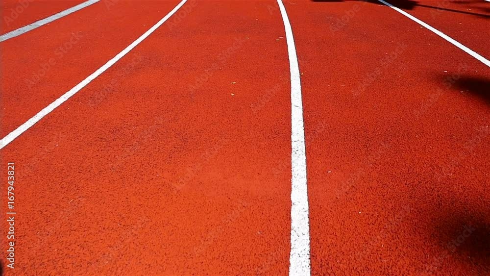 Tracking camera of a running track from the perspective of the runner ...