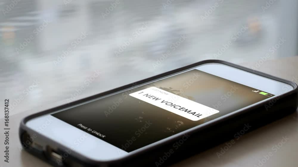 A smartphone with a 1 new voicemail message appearing on screen Stock ...