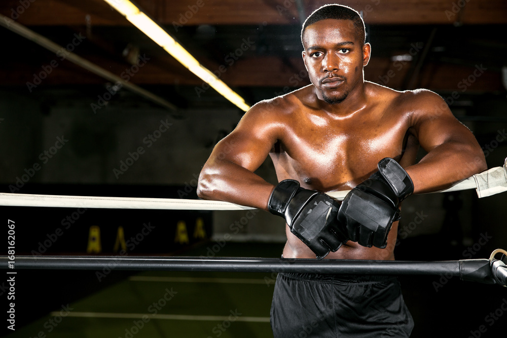 Heavy intense stare from a big muscular intimidating aggressive fighter ...