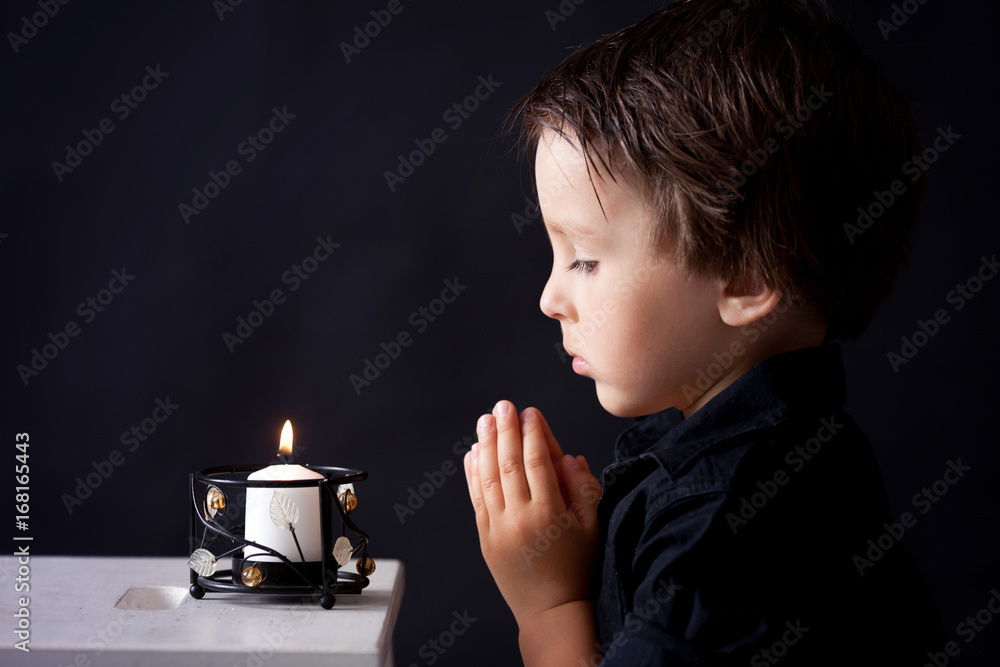 Little boy praying, child praying, isolated background Stock Photo ...