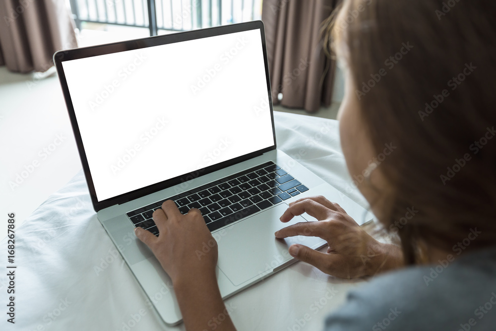 woman typing laptop keyboard white screen on bed inside room Stock ...