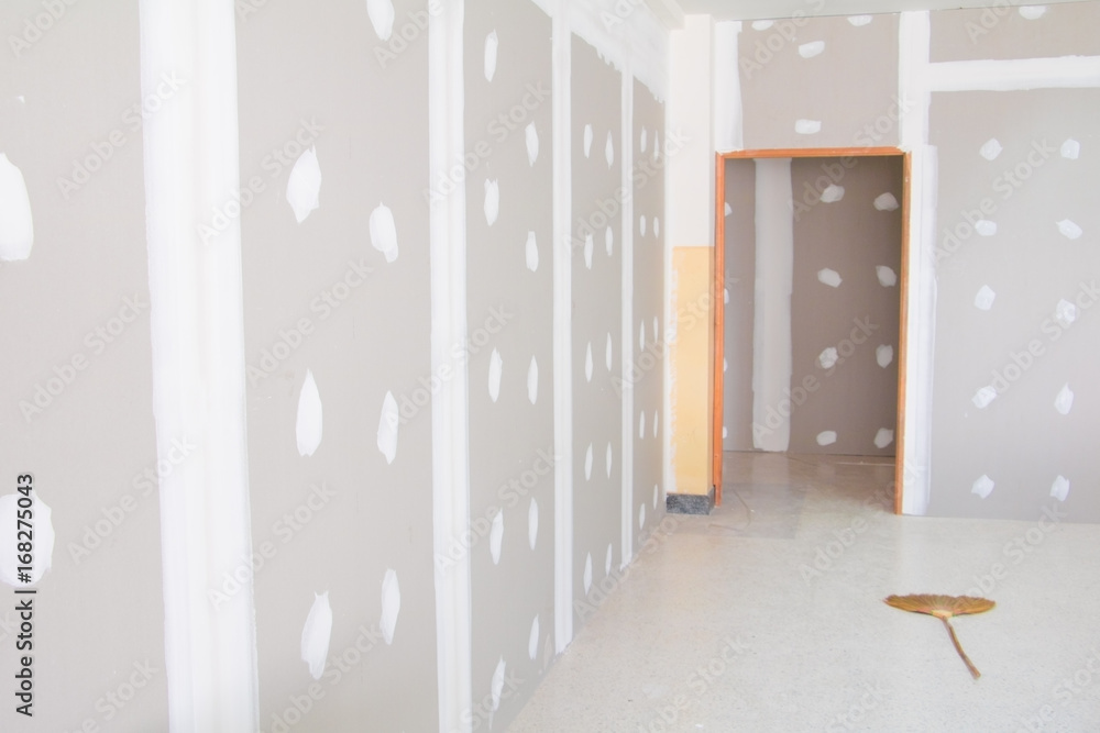 gypsum board wall interior decoration of home at construction site with ...