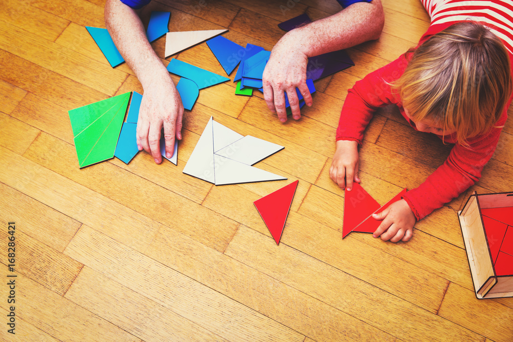 teacher and child playing with geometric shapes Stock Photo | Adobe Stock