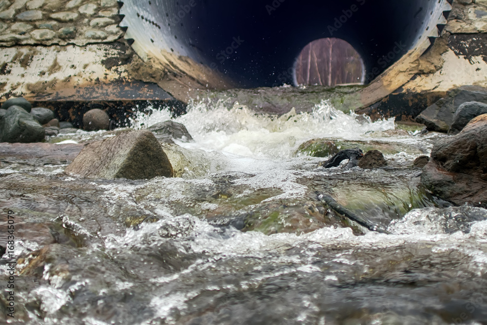 Culvert - drain under road for small river Stock Photo | Adobe Stock