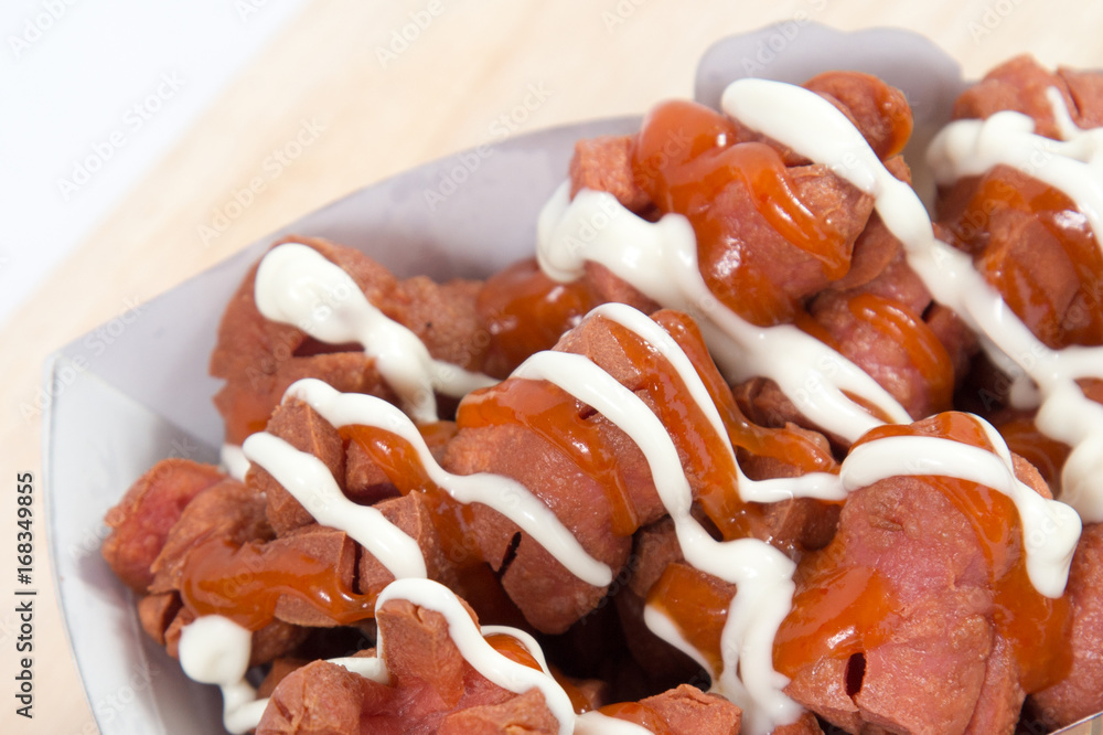 Deep fried chicken sausage slice with mayonnaise and tomato sauce Stock ...
