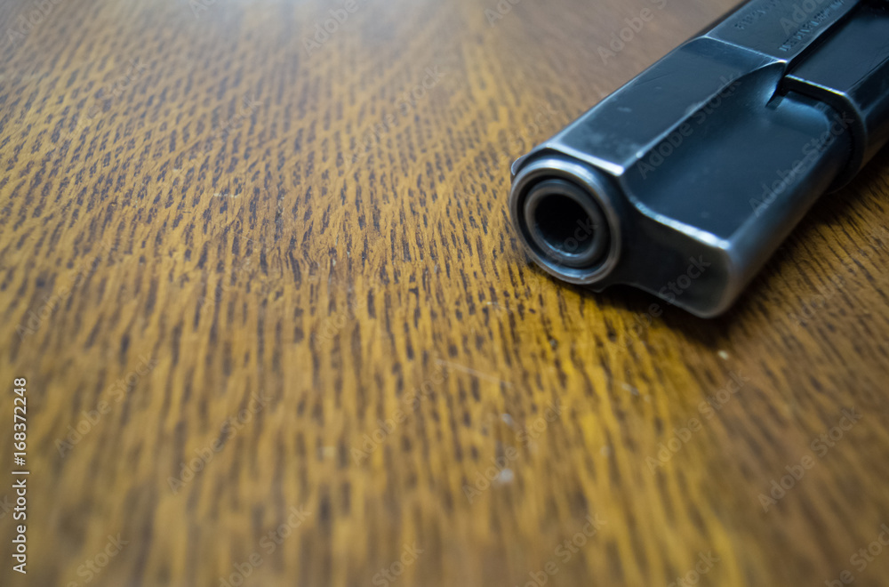 9mm gun on the table Stock Photo | Adobe Stock