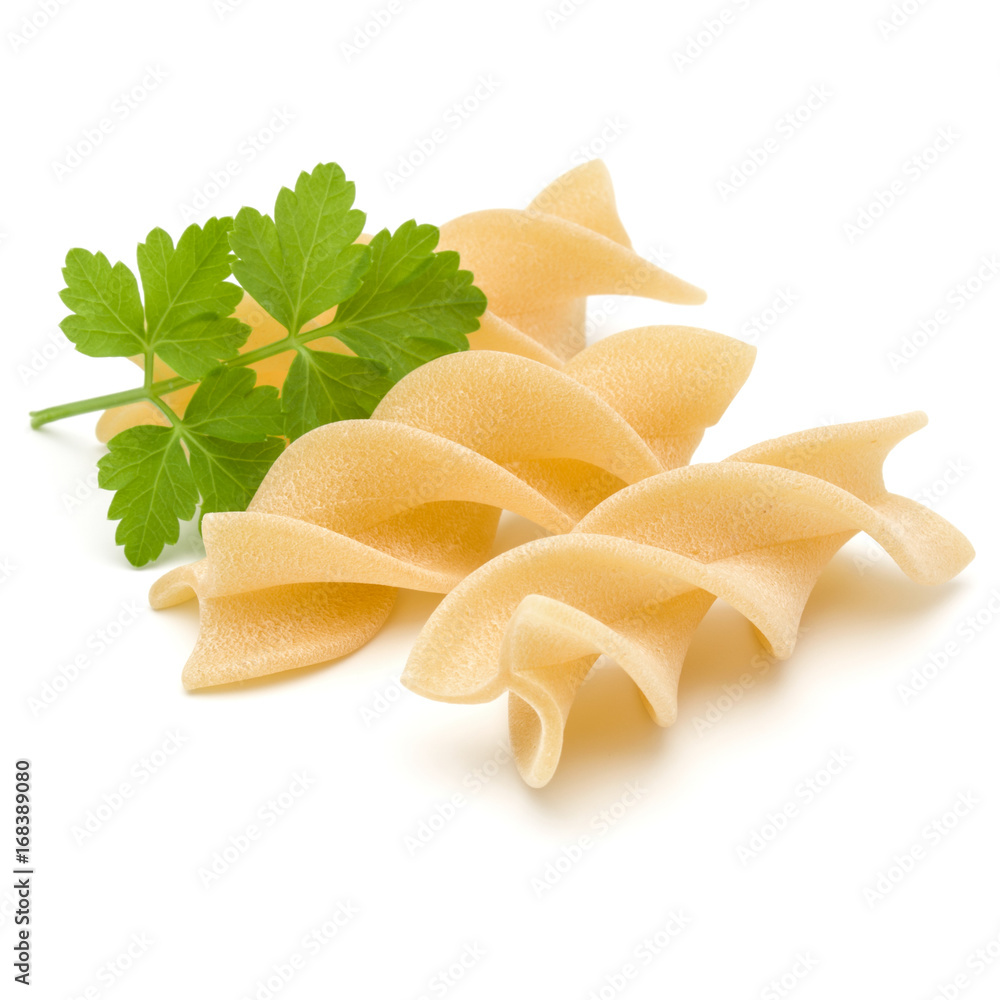 Italian twisted pasta fusilli isolated on white background. Fusilloni ...