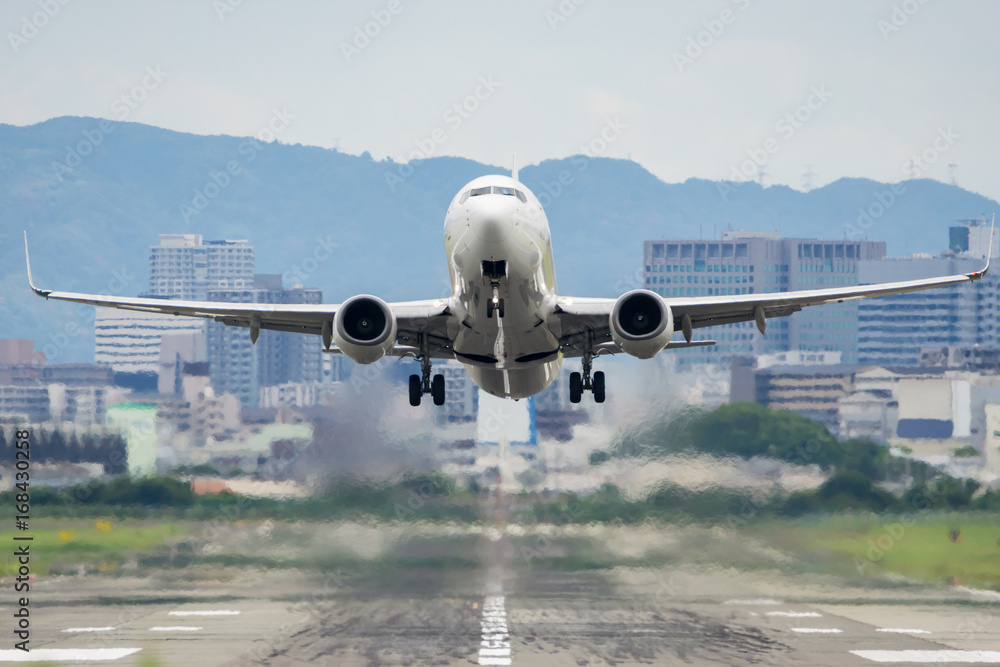 Boeing 737 taking off Stock Photo | Adobe Stock
