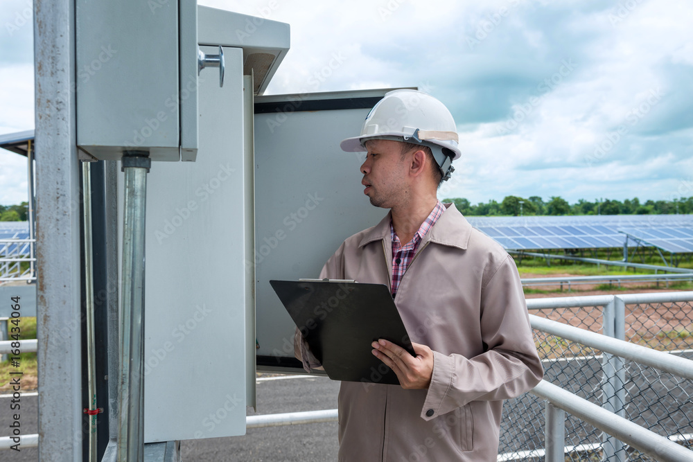 Electrical engineer working at control room of a modern plant. Stock ...