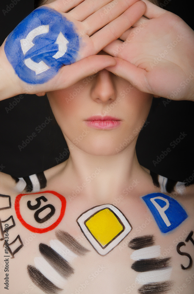 European woman with traffic signs on her body Stock Photo | Adobe Stock