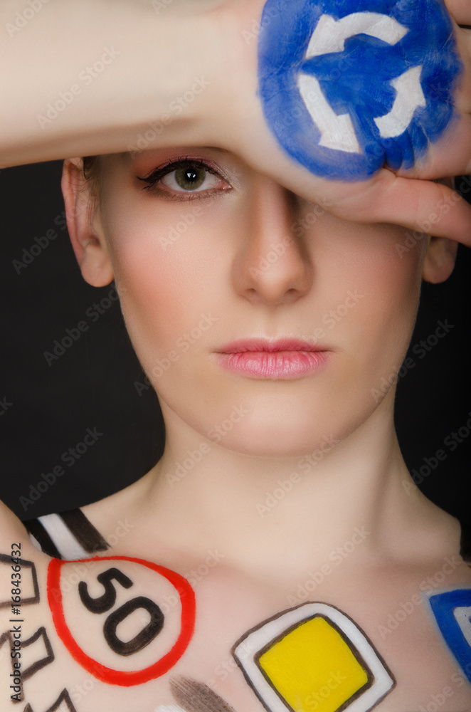 woman with traffic signs on her body Stock Photo | Adobe Stock