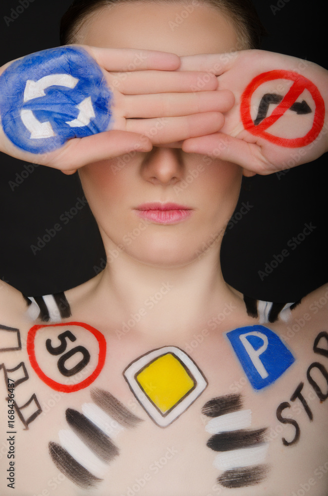Beautiful woman with traffic signs on her body Stock Photo | Adobe Stock