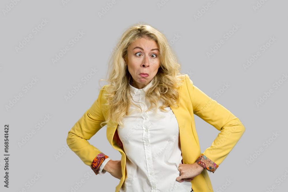 Surprised woman with funny grimace. Young business woman with stupor ...