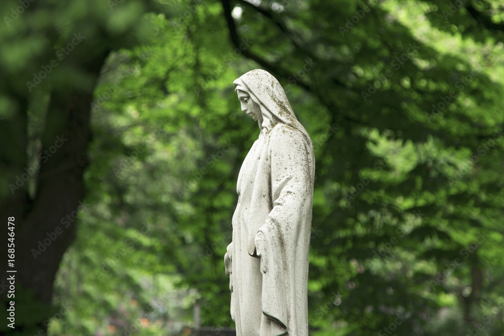 Virgin Mary statue. Vintage sculpture of sad woman in grief (Religion ...
