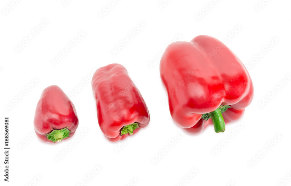 Red bell peppers different sizes on a white background Stock Photo ...