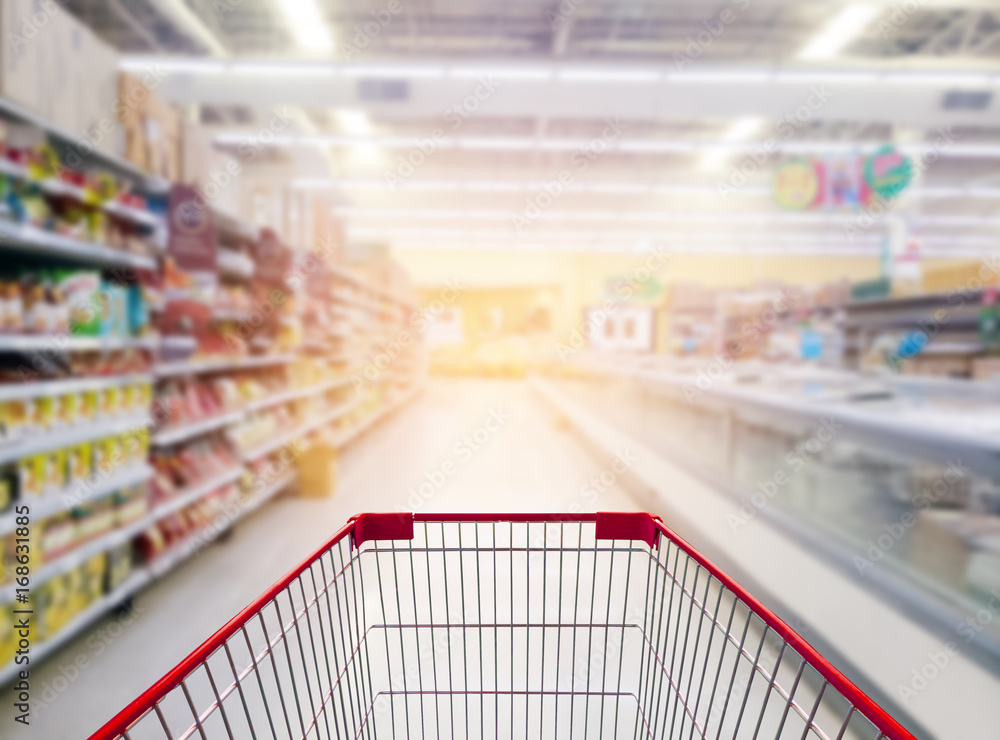 Supermarket store abstract blur background with shopping cart ...