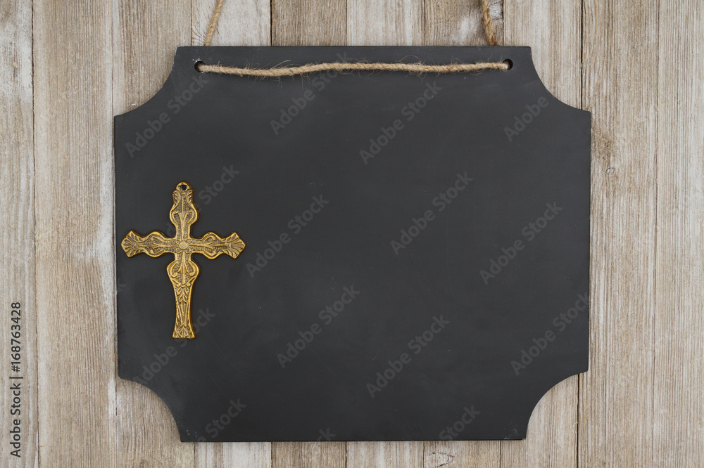 Hanging chalkboard with a gold cross on weathered wood wall Stock Photo ...