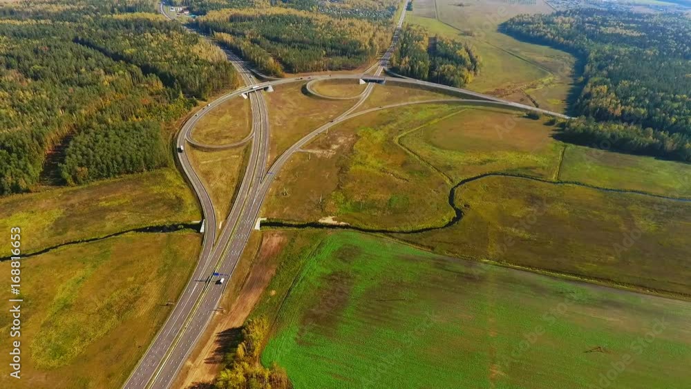 Drone view road junction in field. Road traffic on highway junction ...