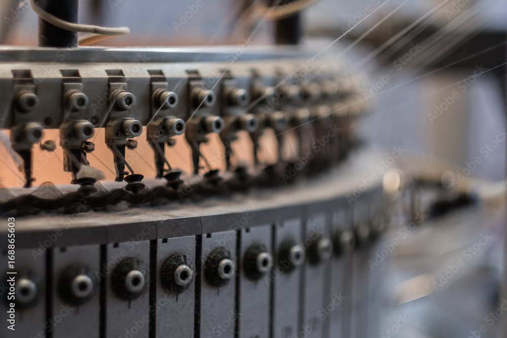 circular knitting machine Stock Photo | Adobe Stock