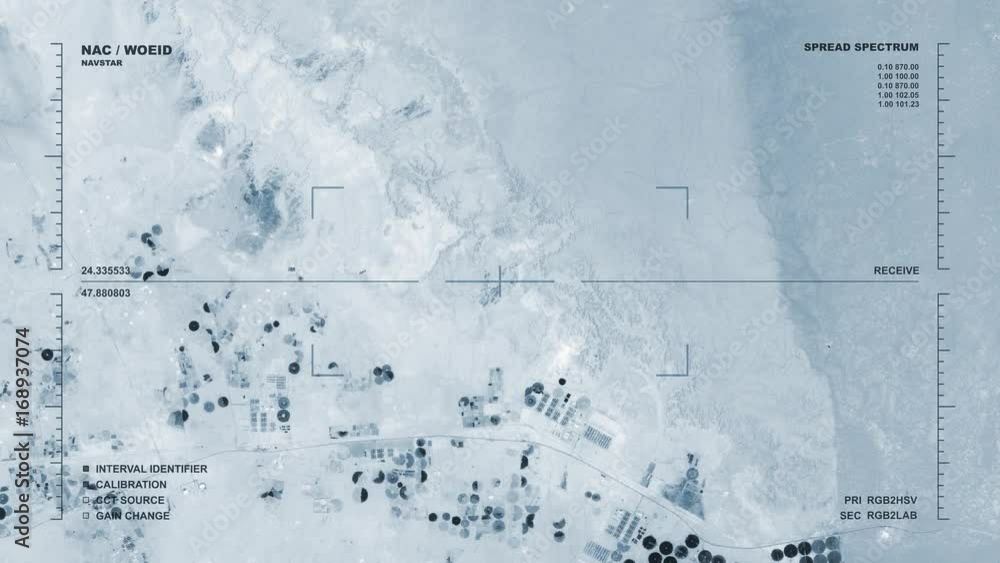 Aerial surveillance flyover of desert farmland in Saudi Arabia ...