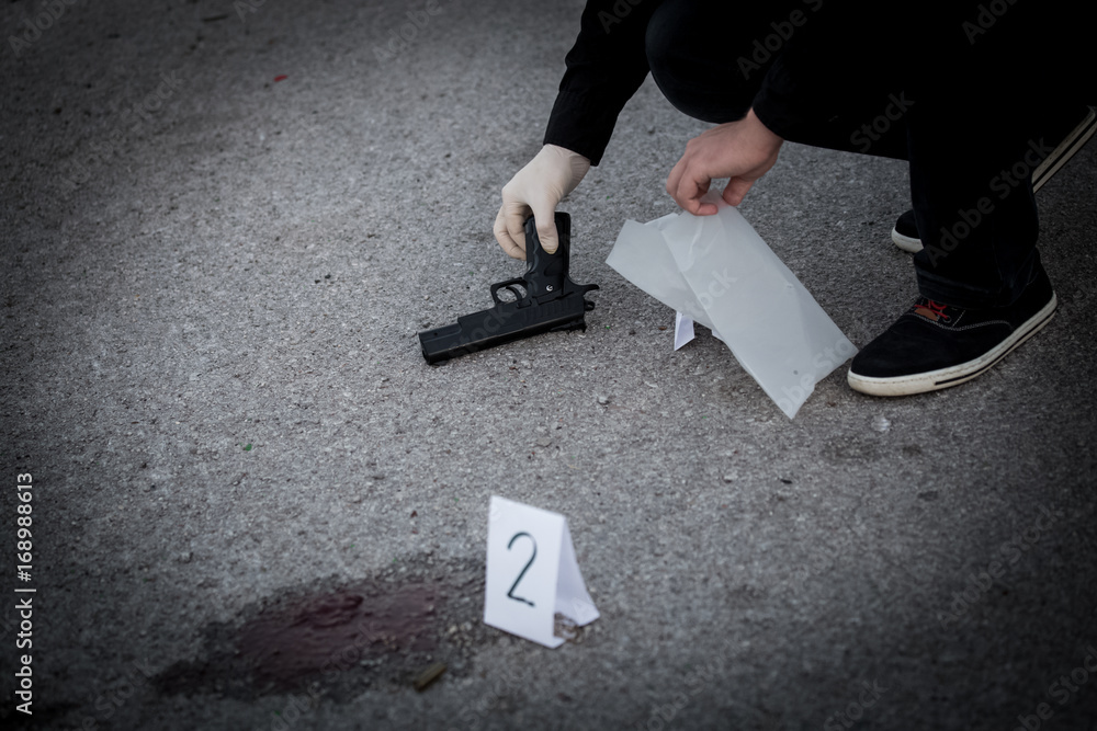The crime scene, murder, investigation, police find rejected the gun ...