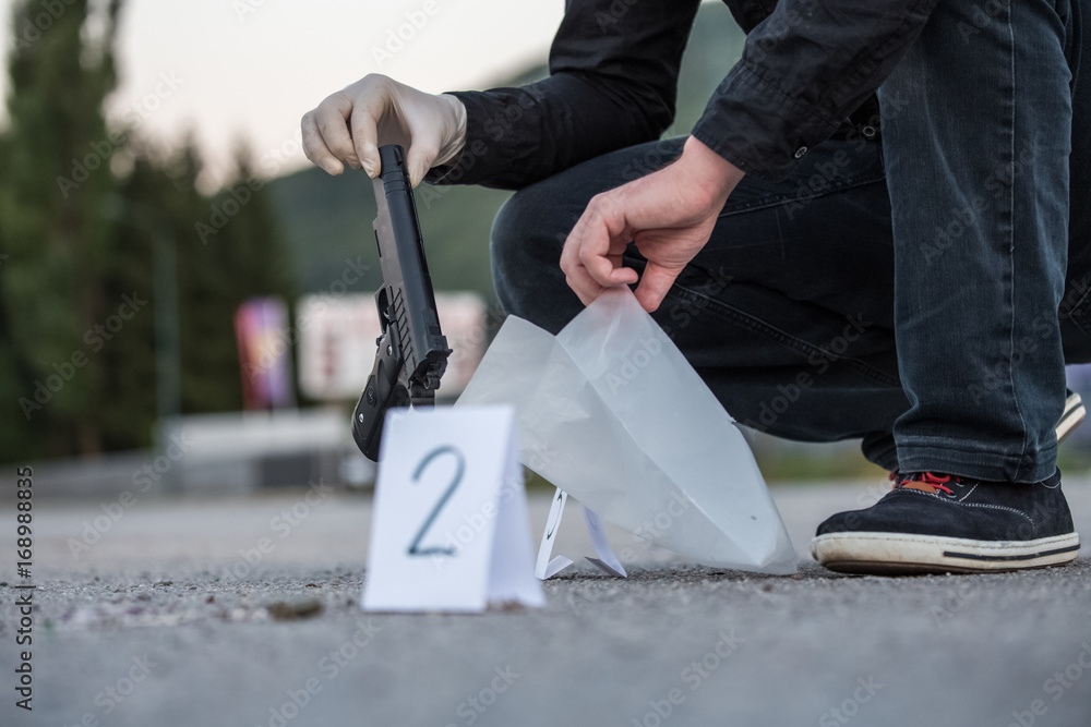 The crime scene, murder, investigation, police find rejected the gun ...