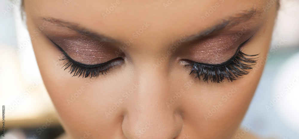 comparing the eyes with and without artificial eyelashes Stock Photo ...