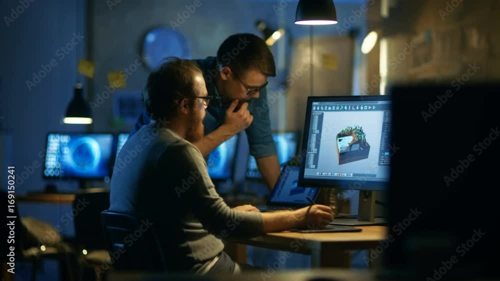 Vidéo Stock Two Male Game Developers Discuss Game Level Drawing, One ...