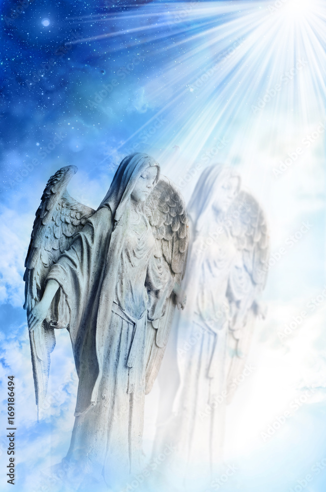 Angel archangel Gabriel over blue sky with divine rays of light Stock ...