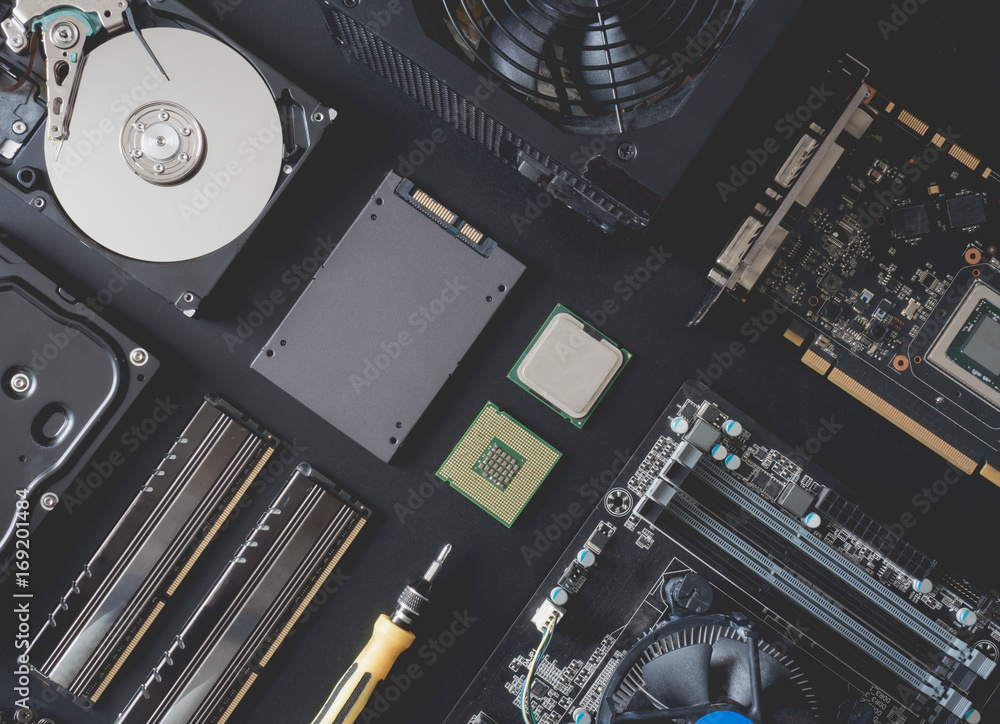 top view of computer parts with harddisk, ram, CPU, graphics card, SSD ...