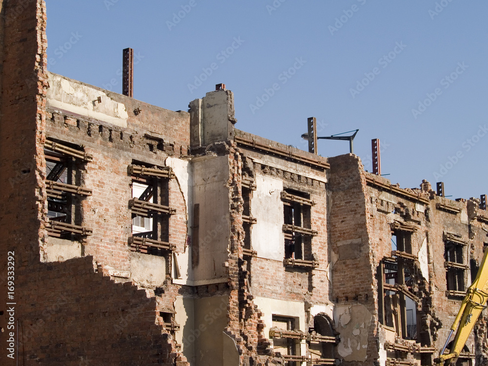 Partly complete demolition of a Victorian era house or office building ...