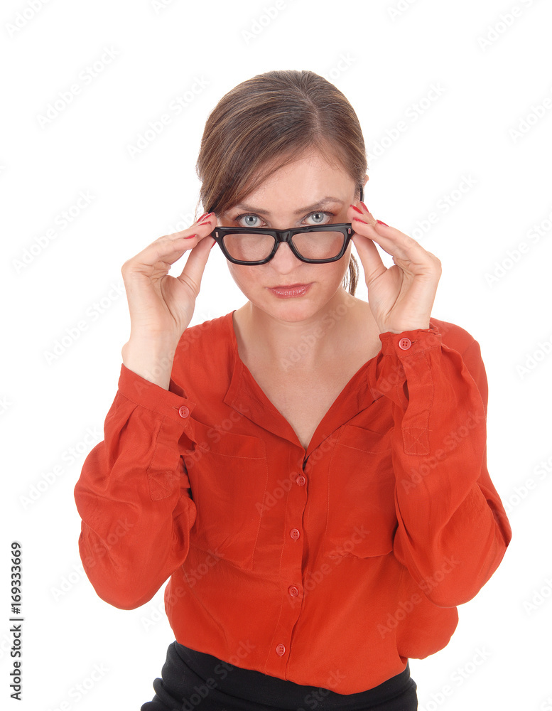 Woman looking over her glasses Stock Photo | Adobe Stock