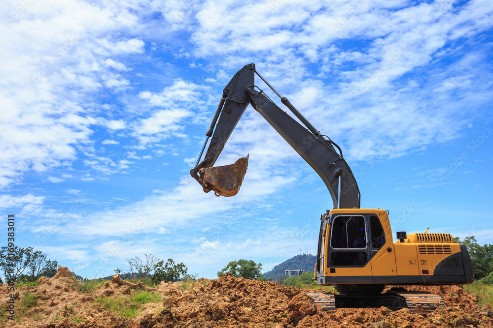 Excavator digging to moving the soil to the truck and adjusting ground ...