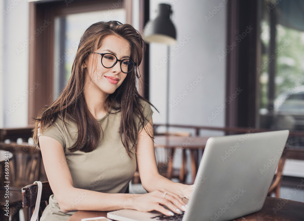 Happy Woman Using Laptop At Cafe Young Beautiful Girl Sitting In A