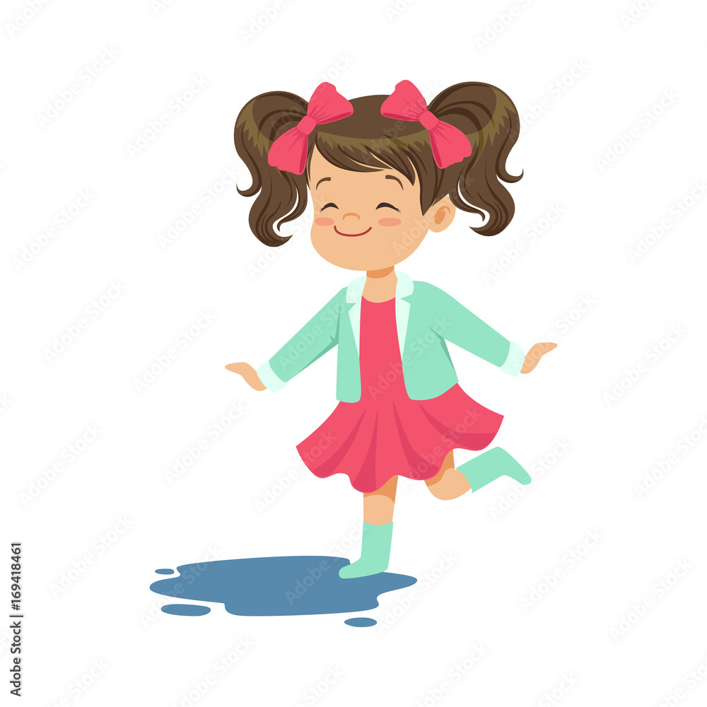 Sweet little girl jumping and splashing through the puddle wearing ...