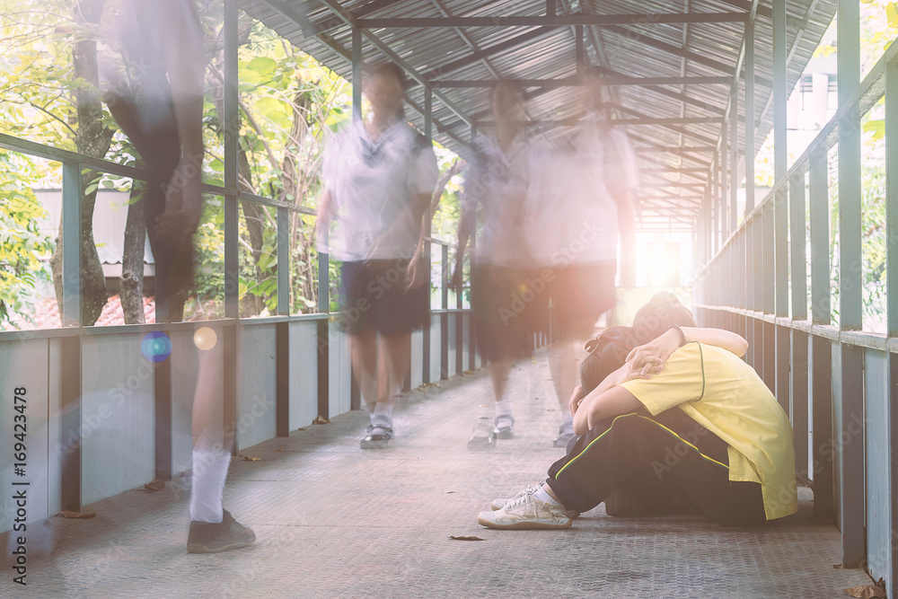 Two best girl friends of student hugging and crying on the walking way ...