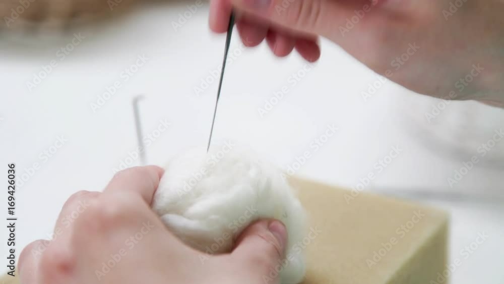 Stages and technique of dry felting of wool: white felt at the hands of ...