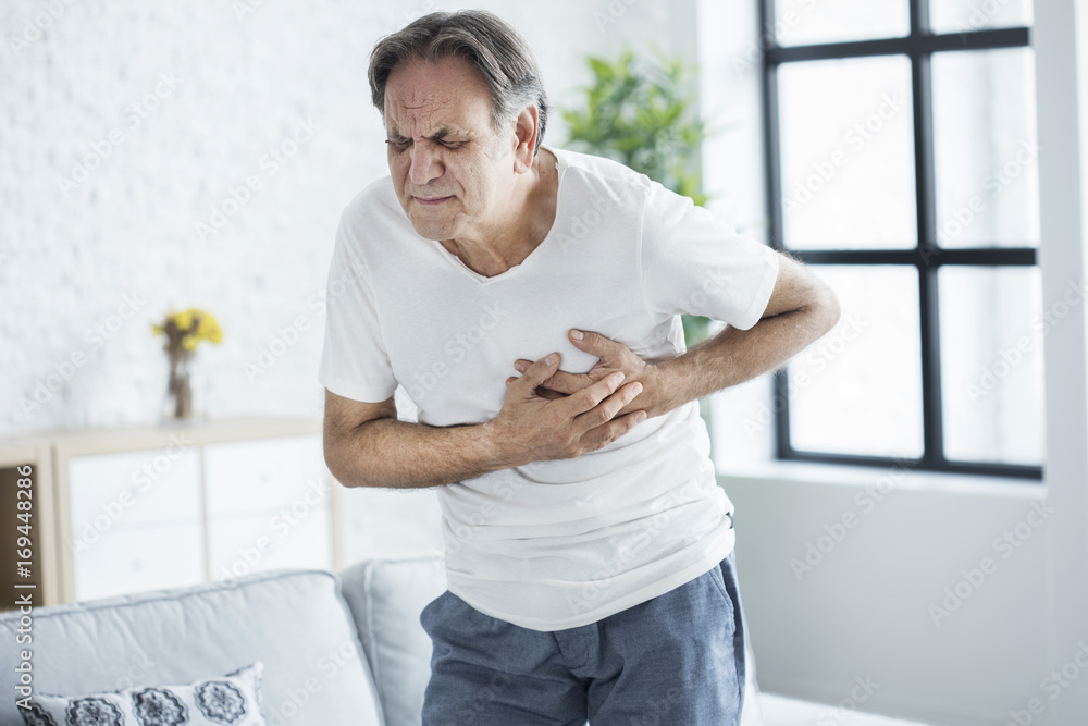 Old man with heart attack Stock Photo | Adobe Stock