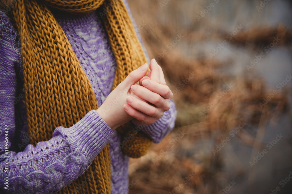 Fall sadness background. Unrecognisible girl in lilac knitted sweater ...