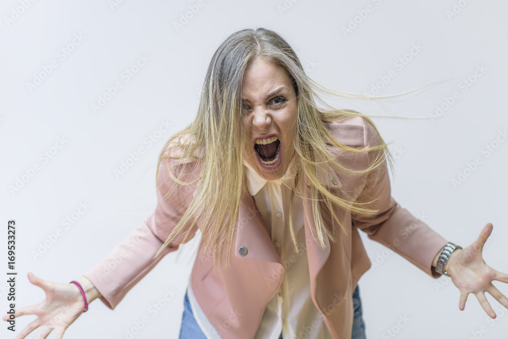 Angry woman yelling, caucasian girl with long hair screaming with rage ...