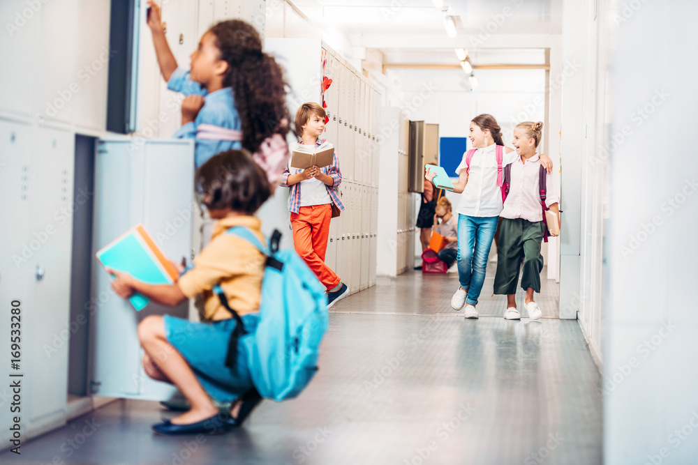kids in school corridor Stock Photo | Adobe Stock