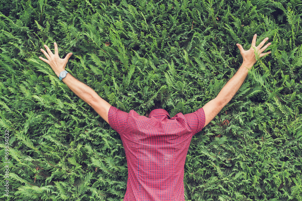 Man Hiding In The Bushes