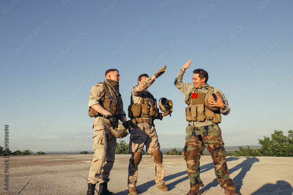 Rangers celebrating success, clapping with hands. Team work conceptual ...