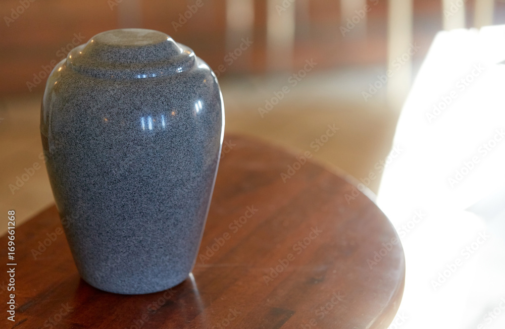 cremation urn on table in church Stock Photo | Adobe Stock