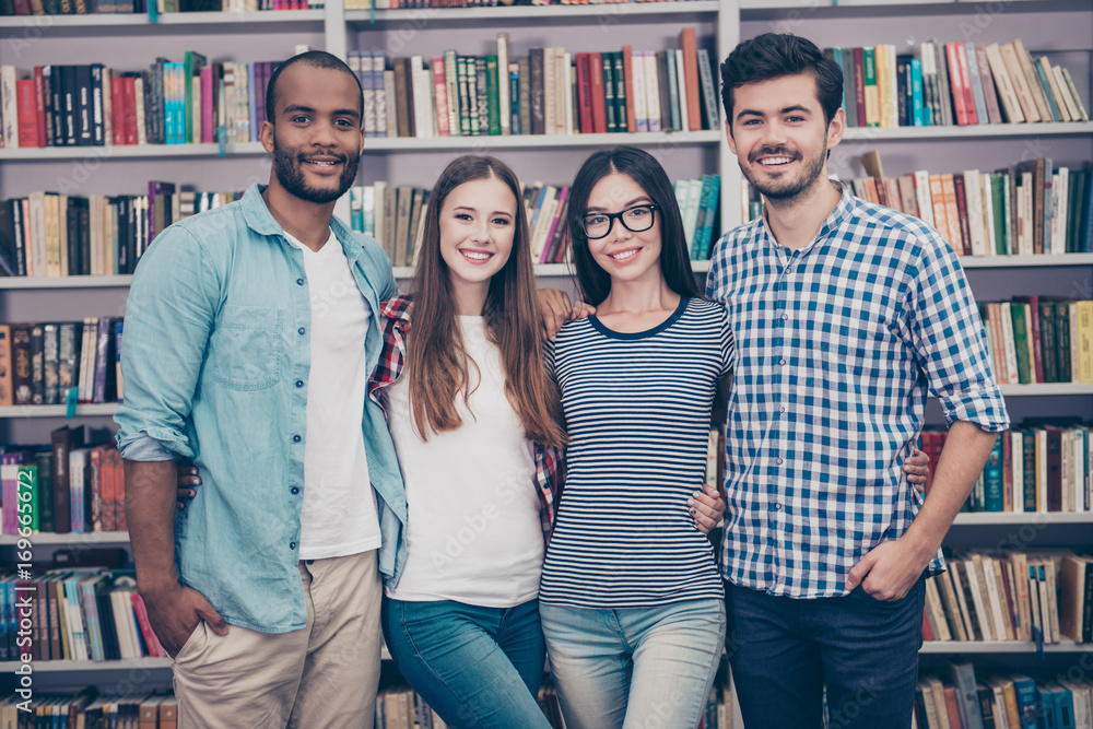 Study together is fun, teamwork,teambuilding concept. Four happy ...