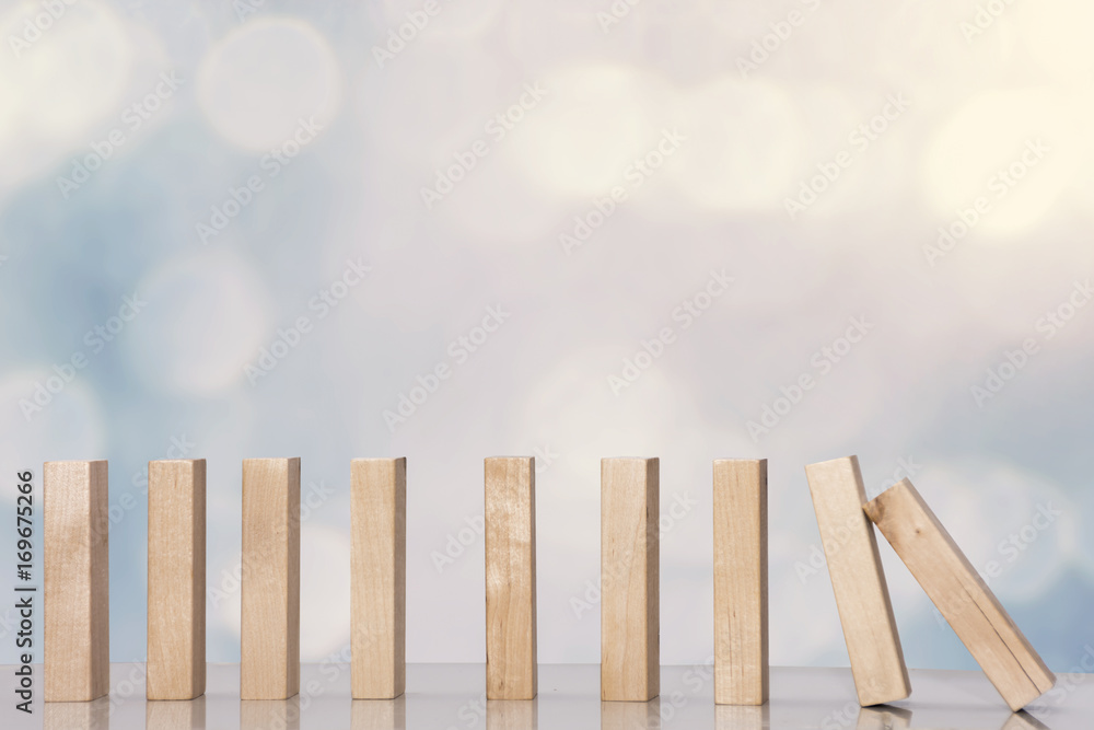 domino effect Risk management and insurance concept, solution for ...