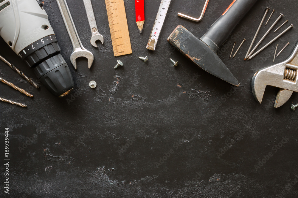 Old building tools on a black background with space for text Stock ...