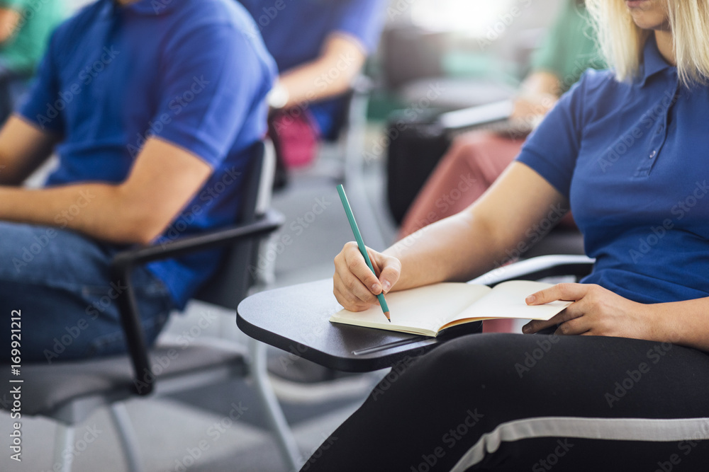 Students Taking Notes Stock Photo | Adobe Stock