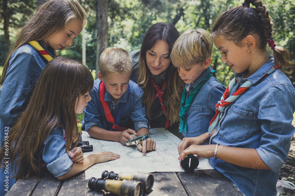 Childern Scouts Learning Orinetation Using A Map Stock Photo | Adobe Stock